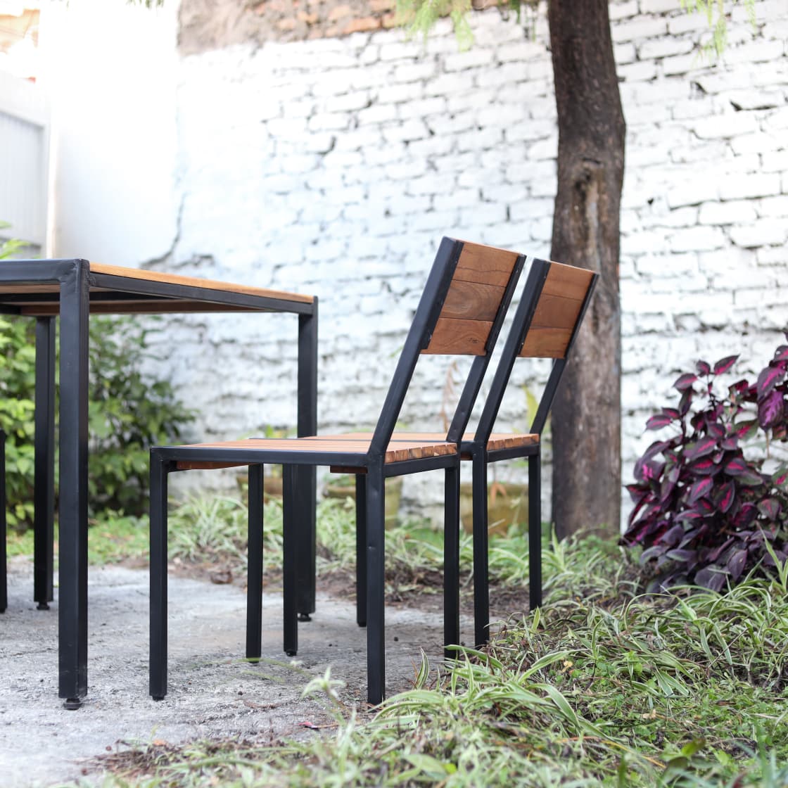 A compact 4-seater outdoor dining set handcrafted with Agrath wood and ...