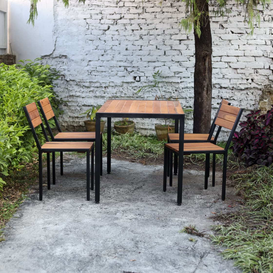 A compact 4-seater outdoor dining set handcrafted with Agrath wood and ...